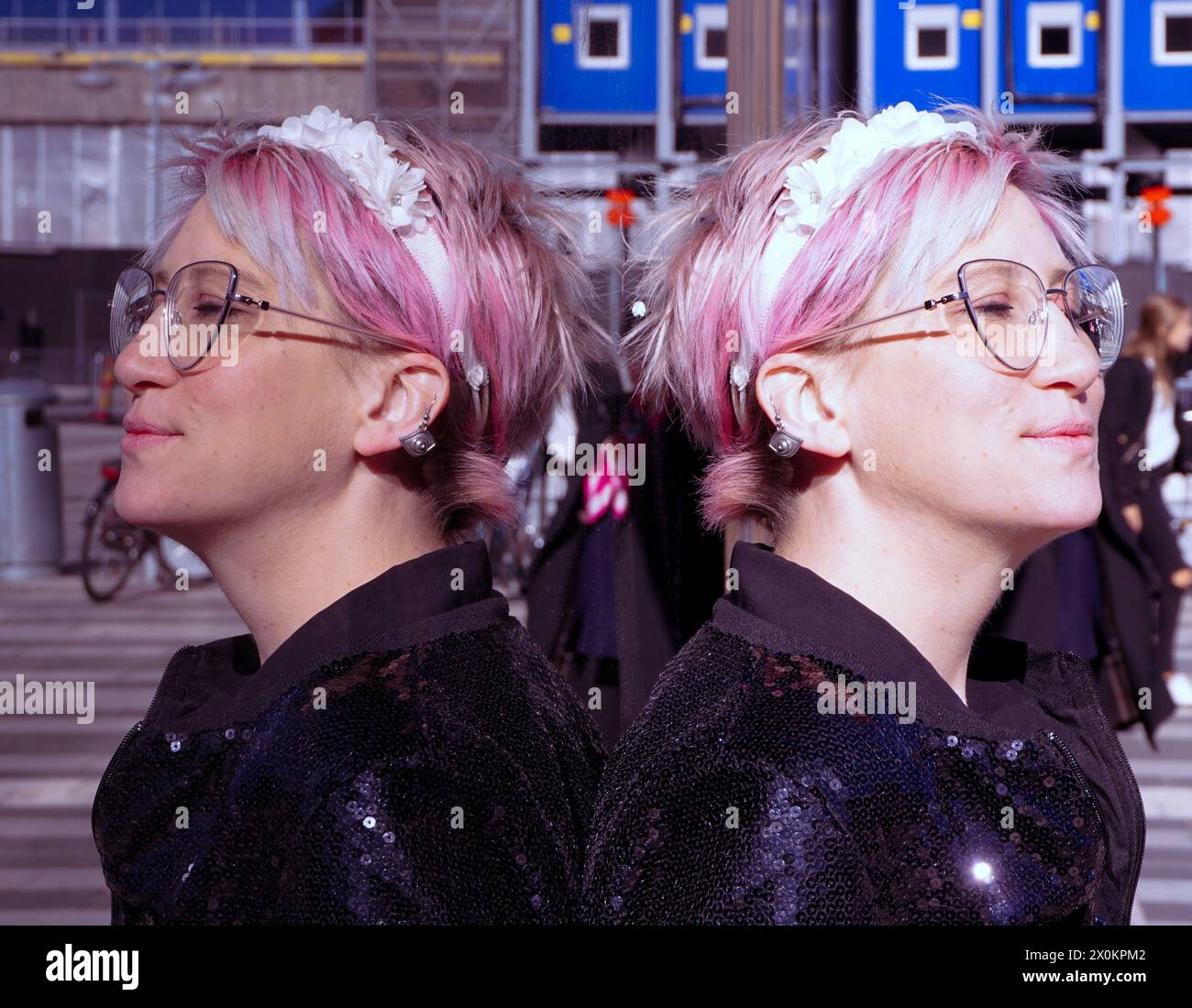 Portrait of a woman leaning her head against a window Stock Photo - Alamy