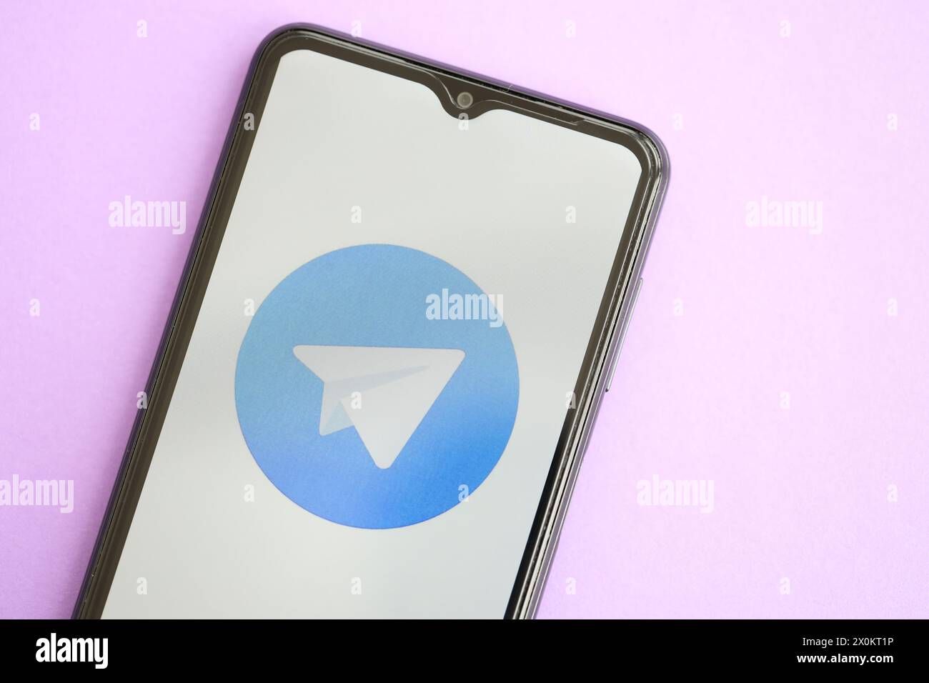 KYIV, UKRAINE - APRIL 1, 2024 Telegram messenger icon on smartphone ...