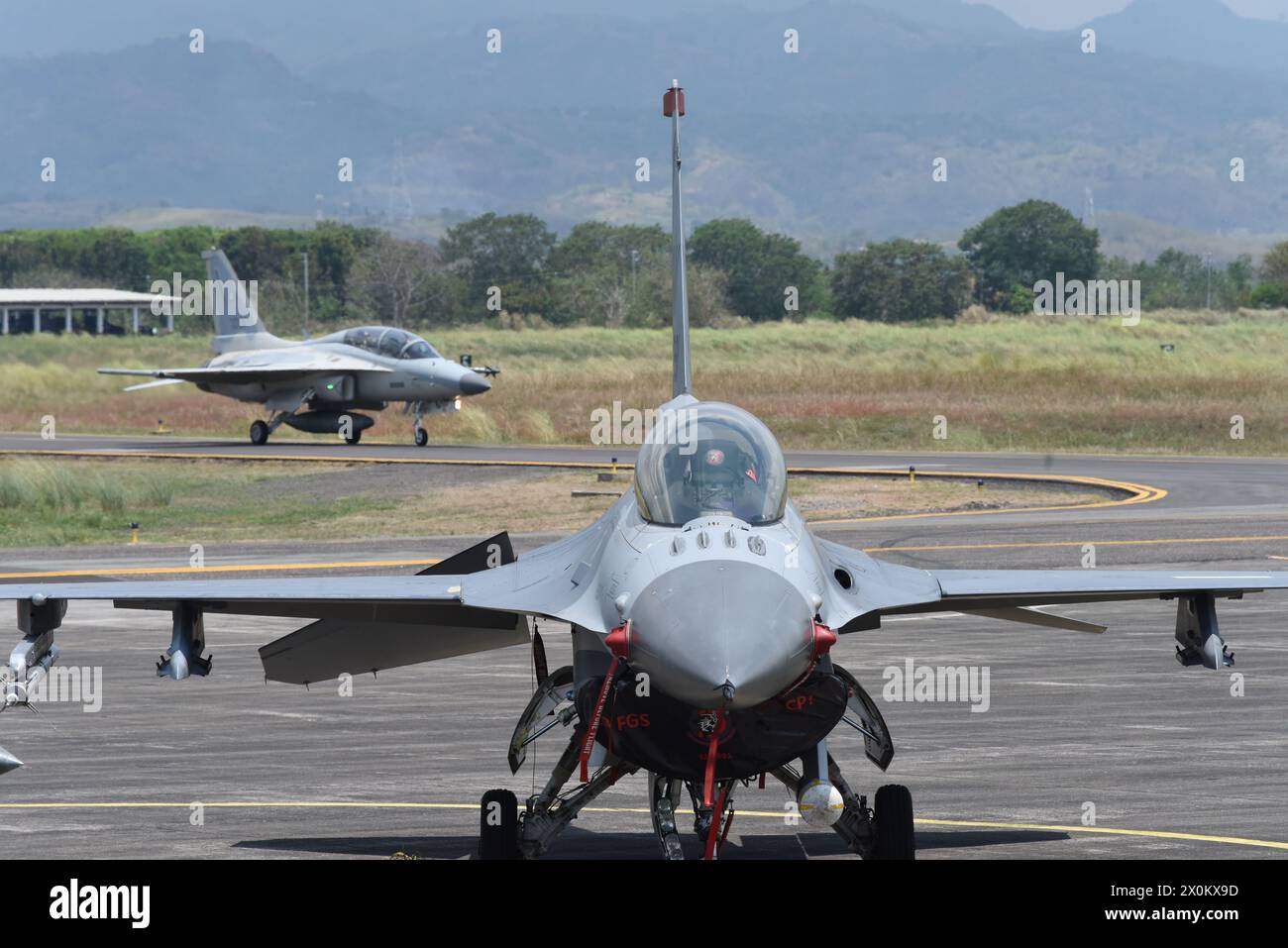 An U.S. Air Force F-16 Fighting Falcon takes off as part of flight ...