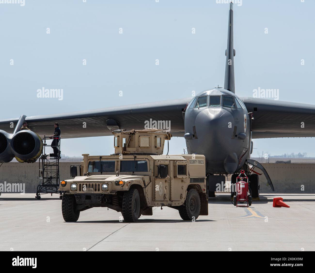 5th Security Forces Squadron defenders stand guard on the flightline ...
