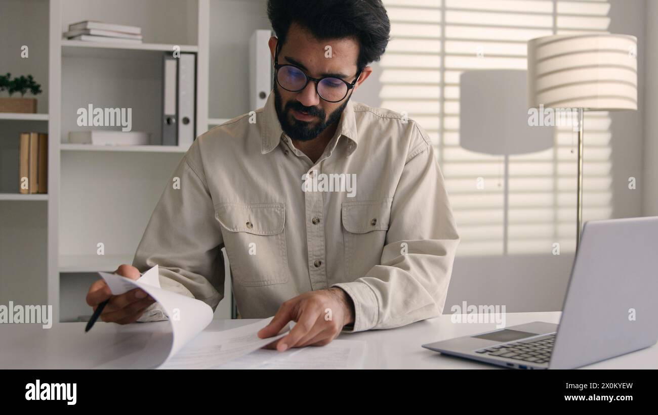 Indian businessman signing document hi-res stock photography and images ...