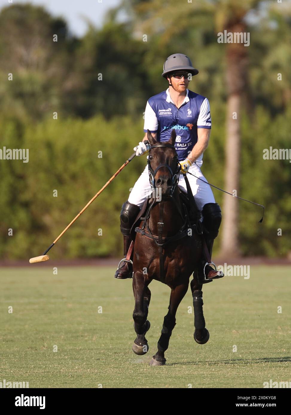 The Duke of Sussex plays in a polo match during the Royal Salute Polo Challenge, to benefit ...