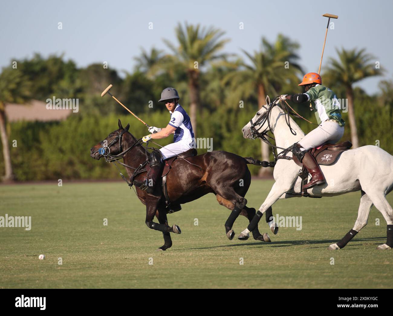 The Duke of Sussex (left) plays in a polo match during the Royal Salute Polo Challenge, to ...
