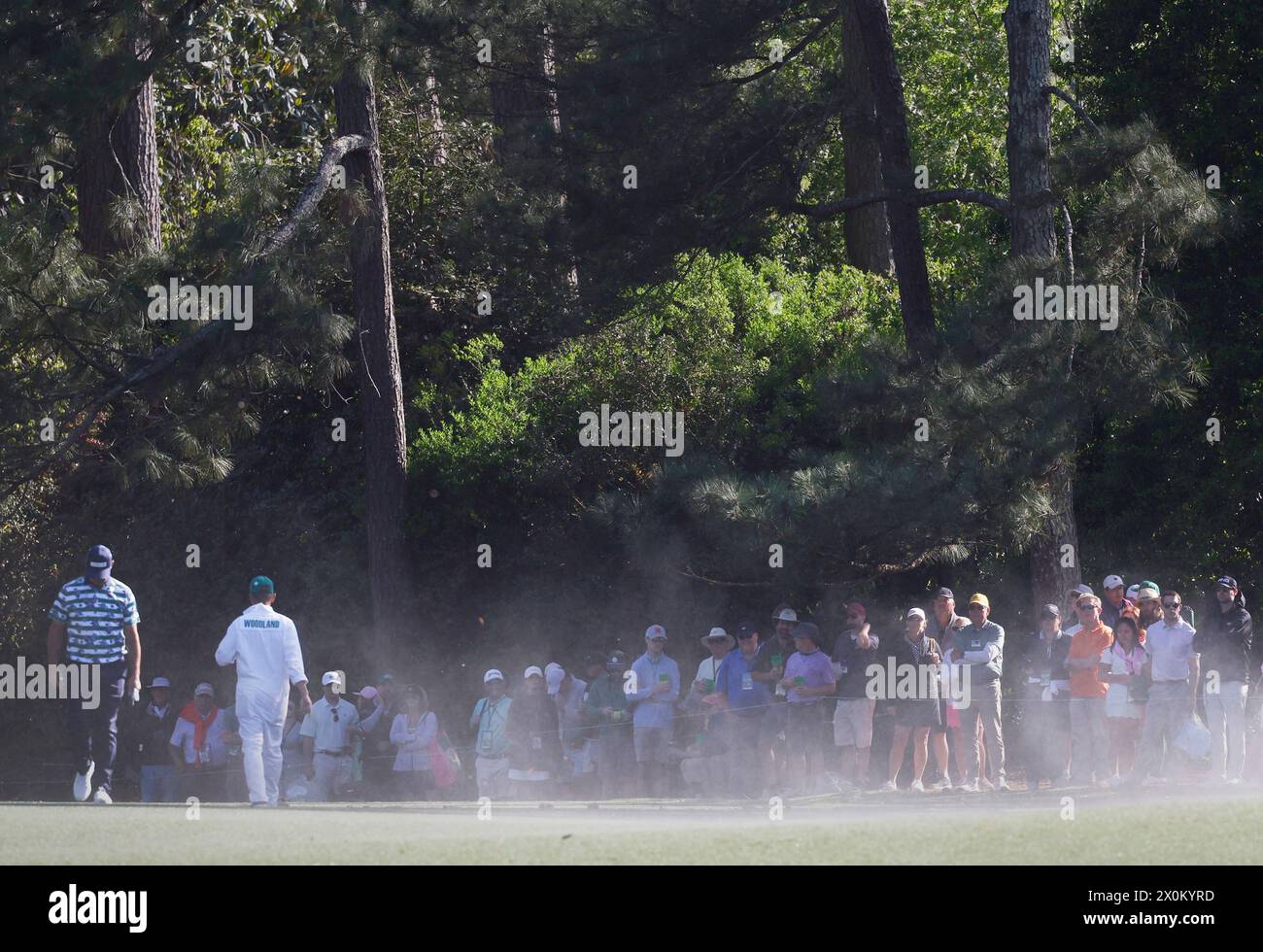 Augusta, United States. 12th Apr, 2024. Gary Woodland and his caddie ...