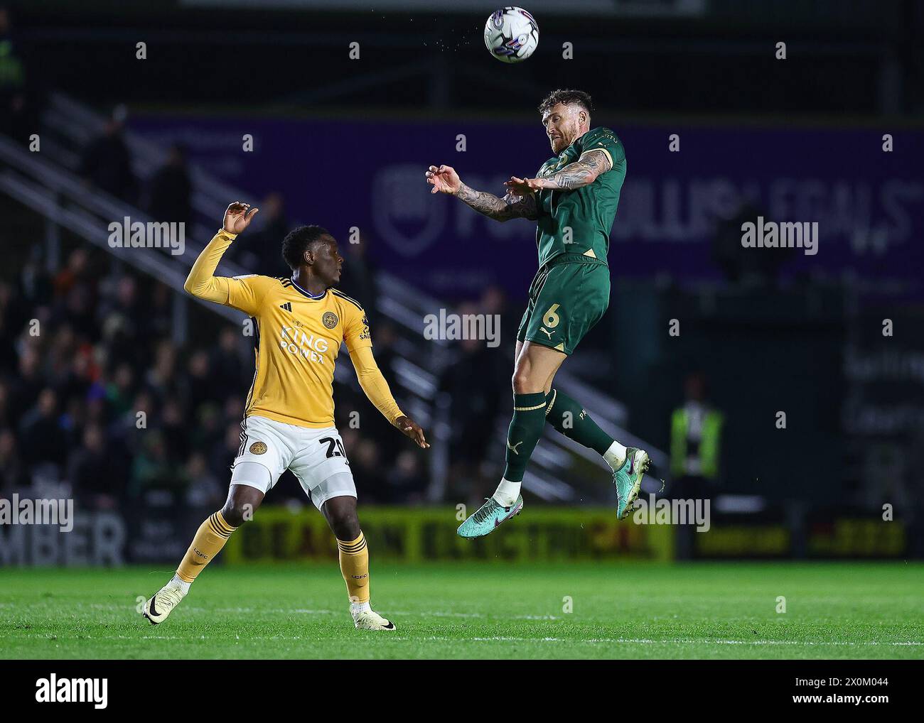 Dan Scarr of Plymouth Argyle wins aerial ball during the Sky Bet ...