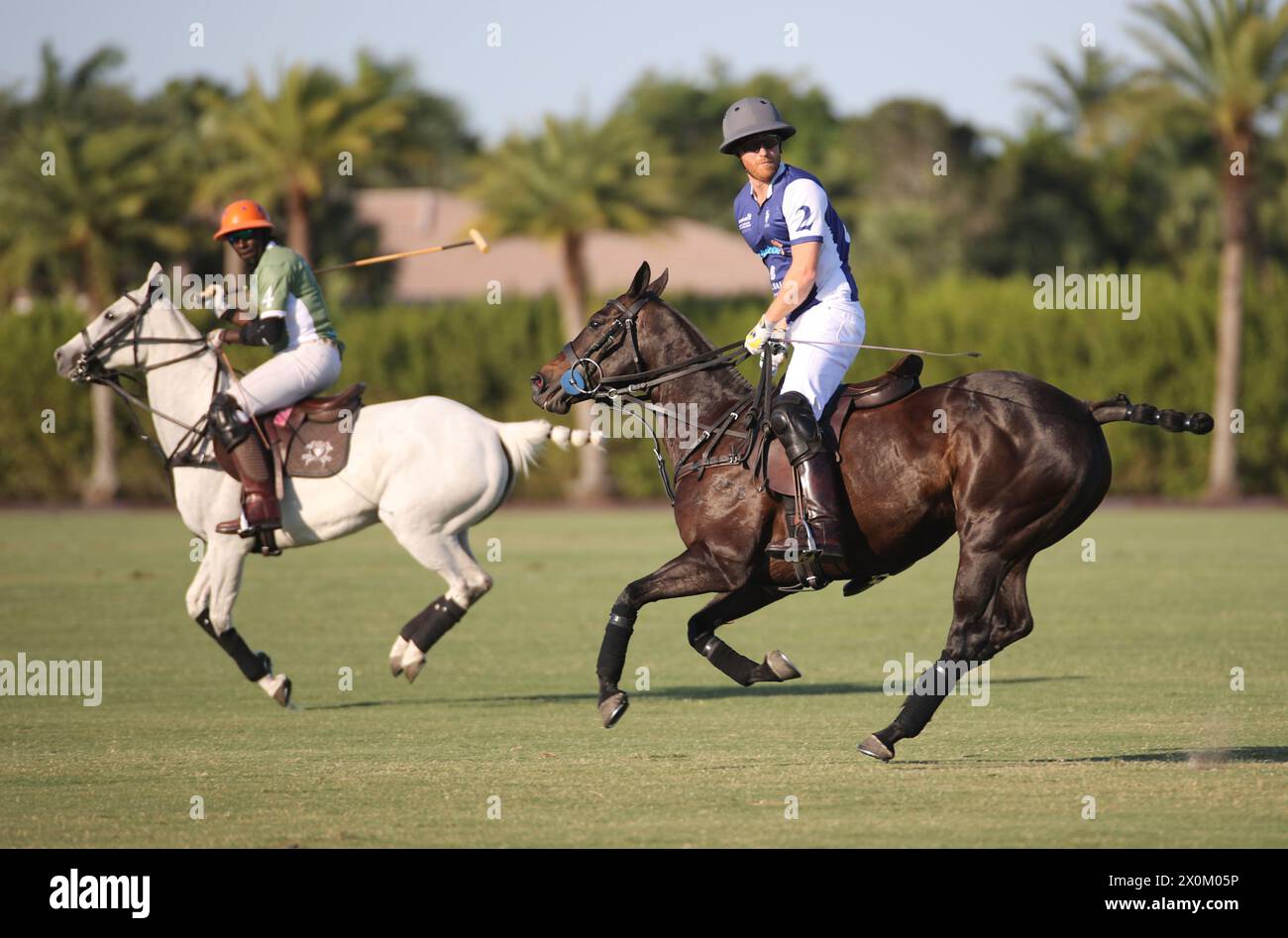 The Duke of Sussex (right) plays in a polo match during the Royal Salute Polo Challenge, to ...