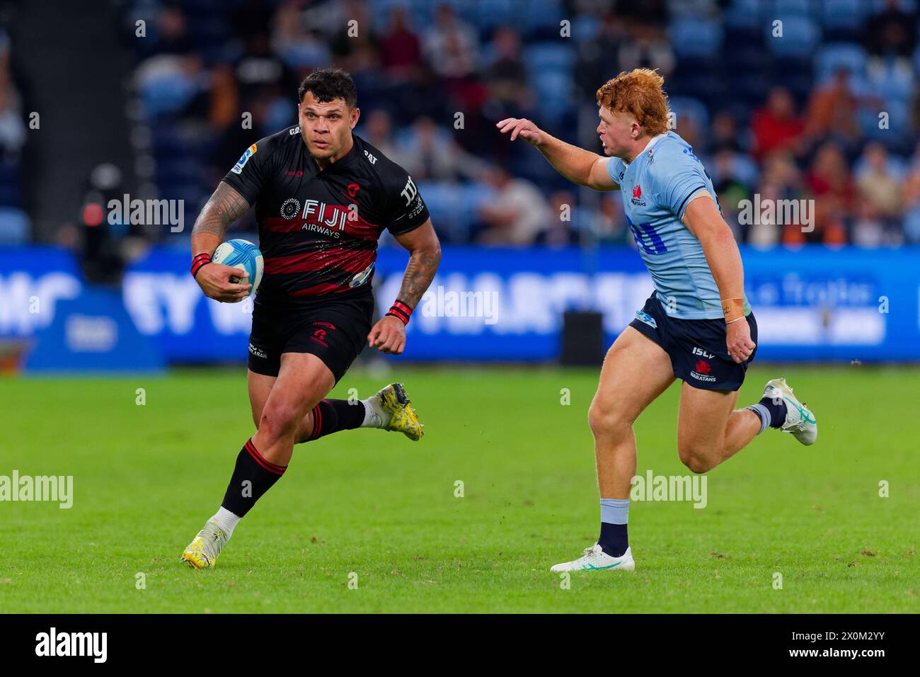 Sydney, Australia. 12th Apr, 2024. Levi Aumua of the Crusaders runs ...