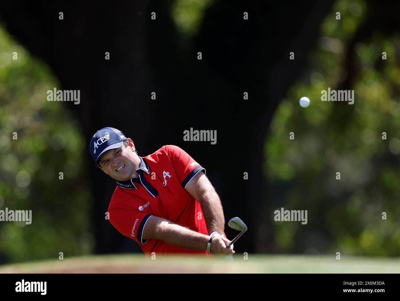 Patrick Reed chips up onto the eighteenth green in the second round of ...