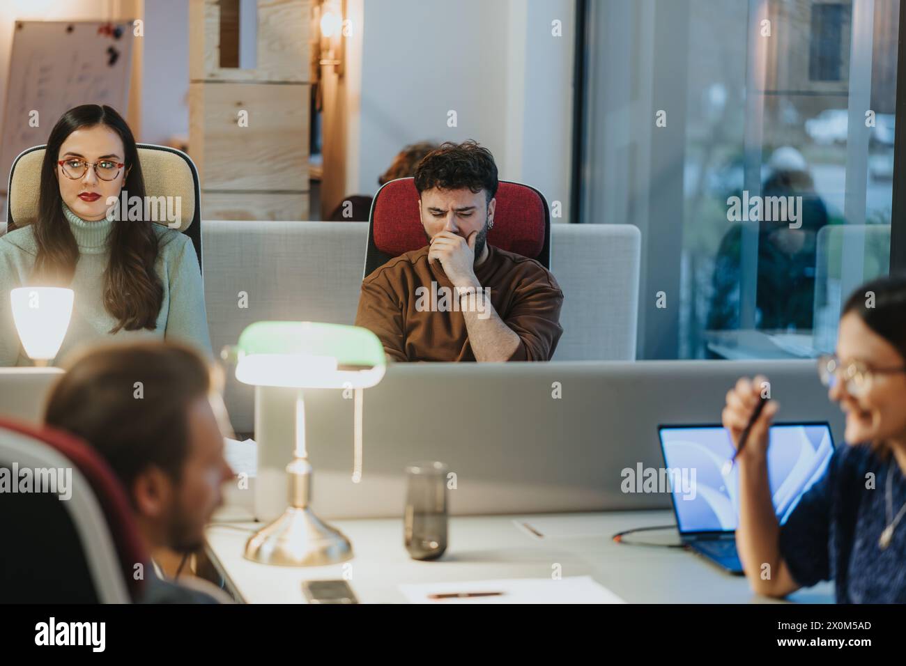 A group of people experiencing stress and frustration while working ...