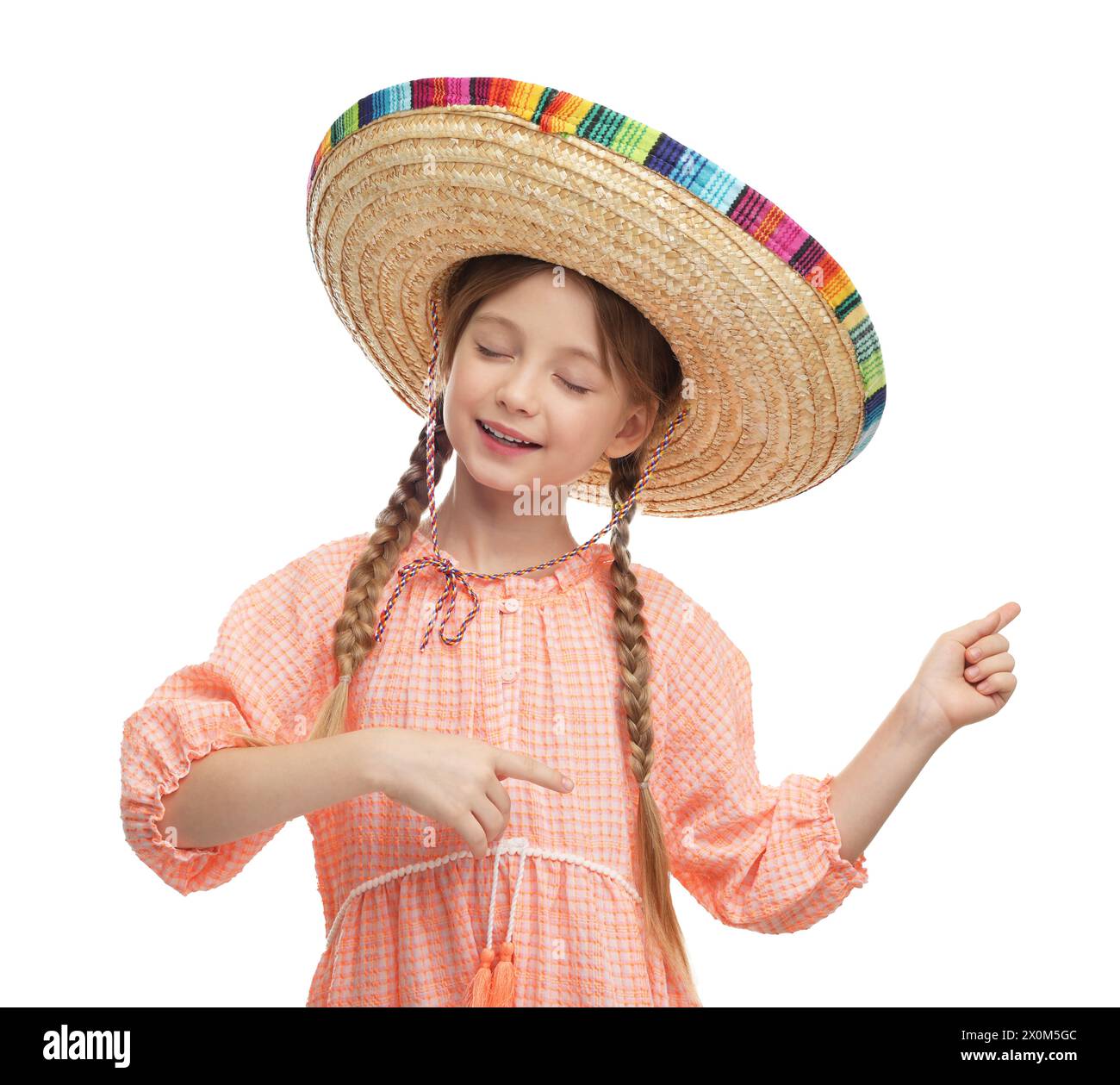 Cute girl in Mexican sombrero hat dancing on white background Stock ...
