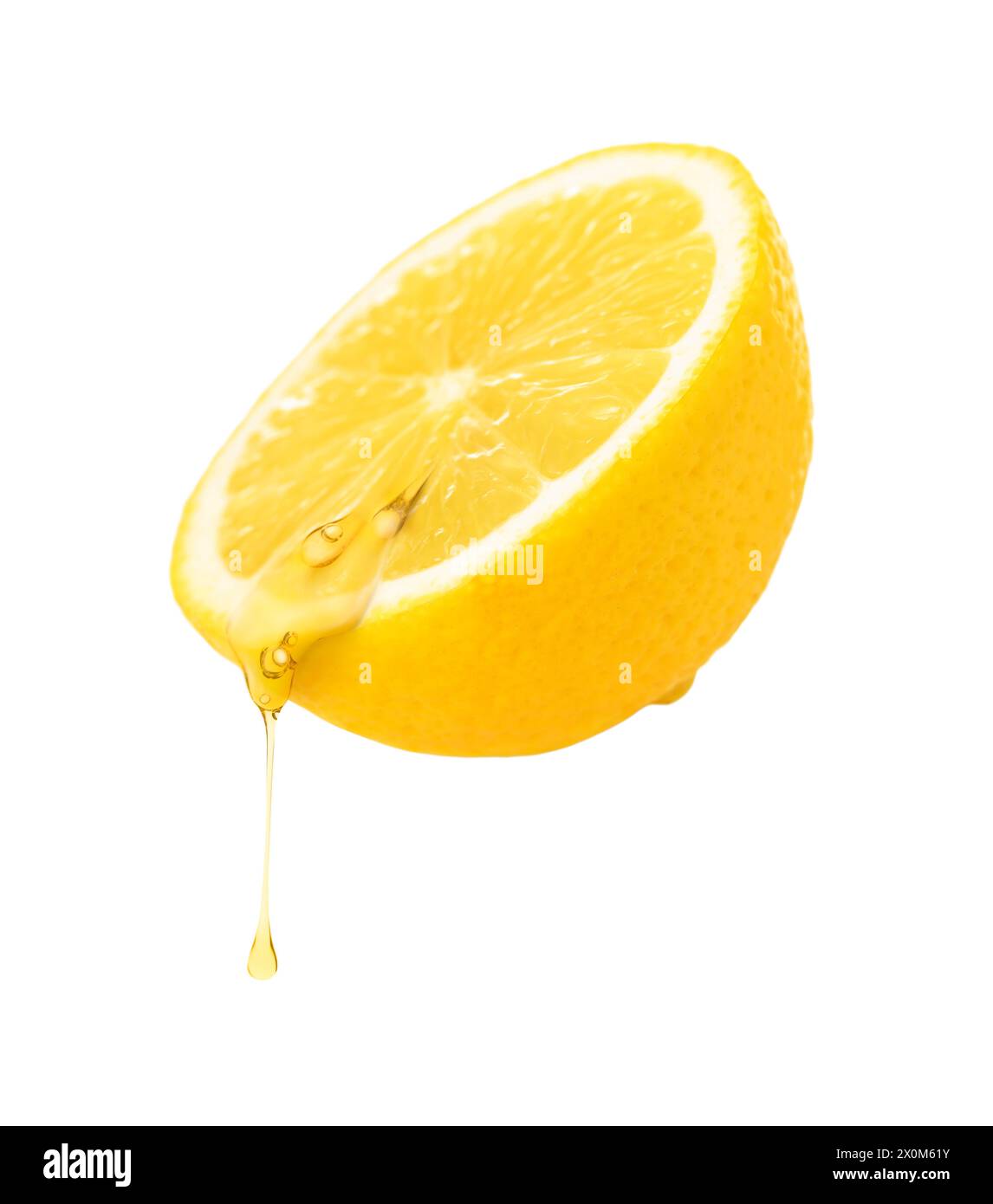 Juice dripping from half of lemon isolated on white Stock Photo - Alamy