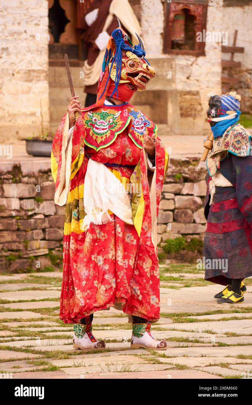 A man in colourful, traditional costume dancing as part of the Ura ...