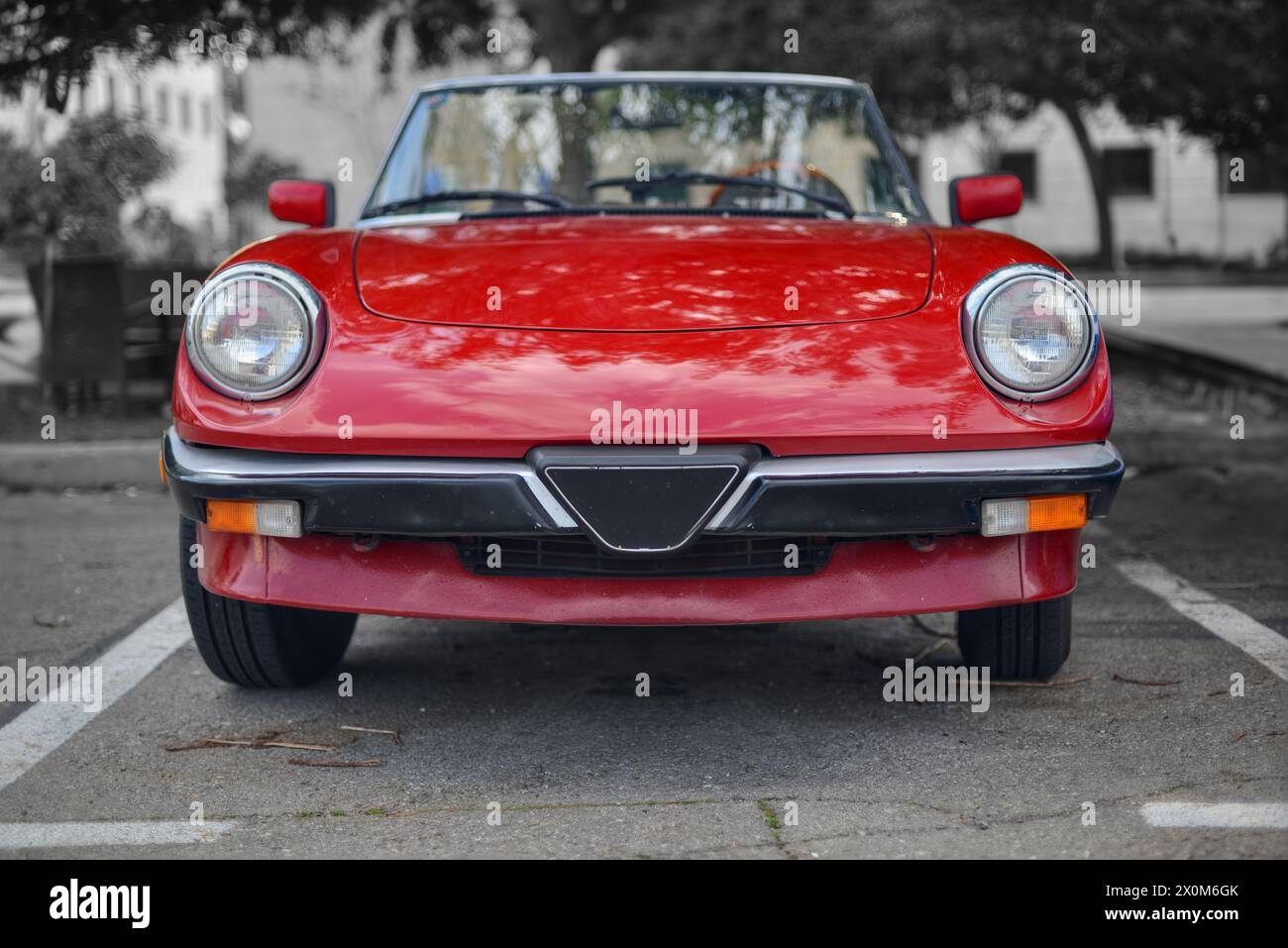 A frontal photo of an red Italian roadster car Stock Photo - Alamy