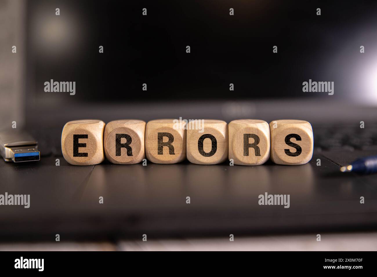 error. Wooden letters on the office desk, informative and communication ...