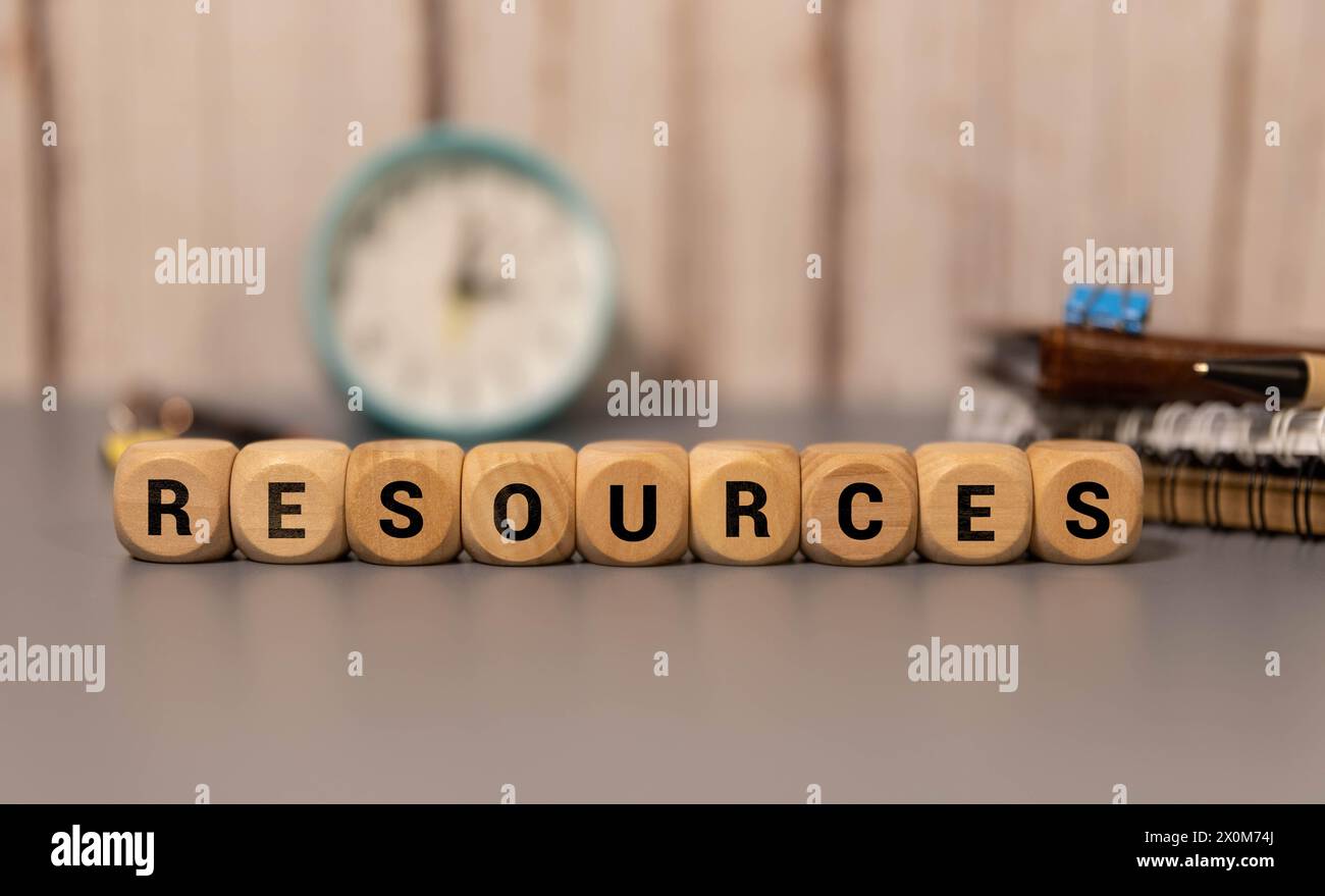 Resources Word In Wooden Cube Stock Photo - Alamy