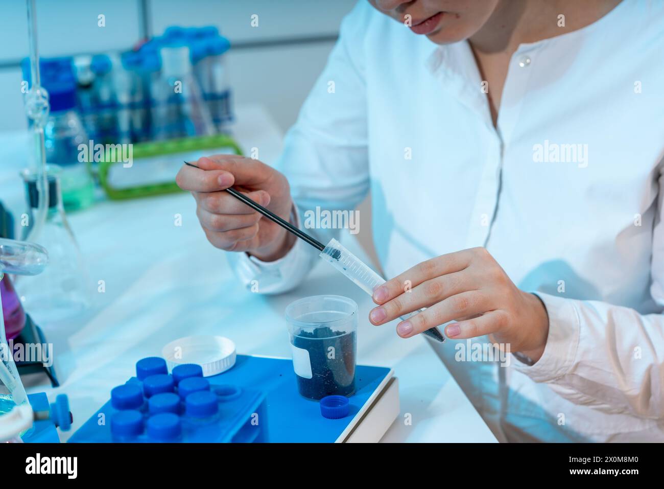 Scientist analysing soil in laboratory Stock Photo - Alamy