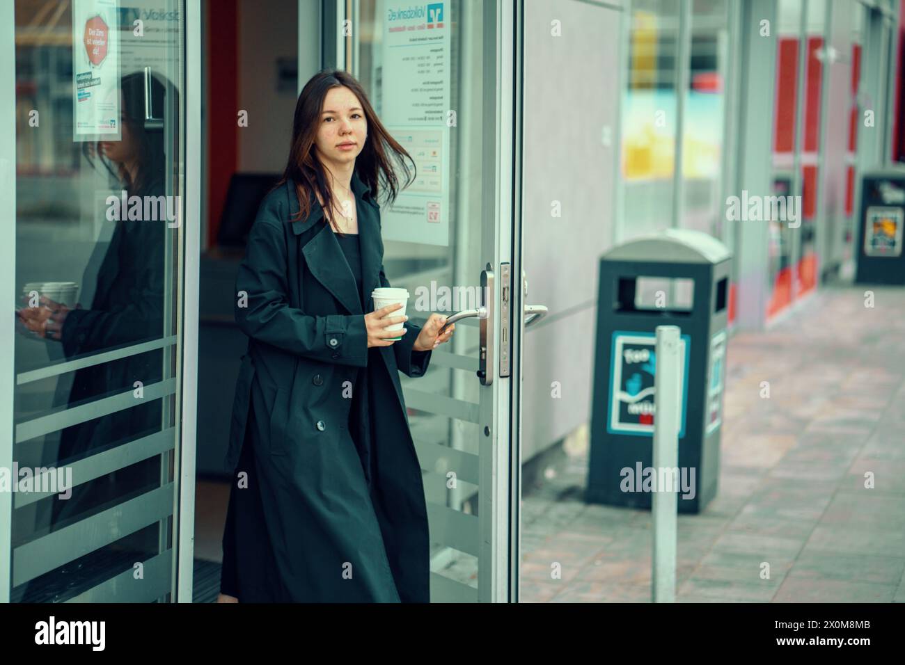 Exiting building hi-res stock photography and images - Alamy