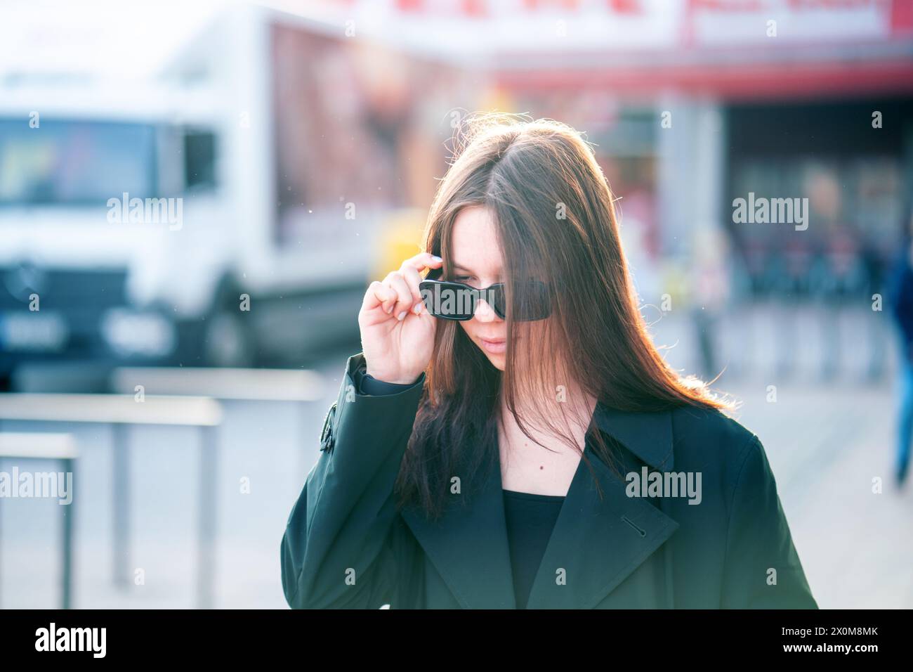 Teenage girl wearing sunglasses Stock Photo - Alamy