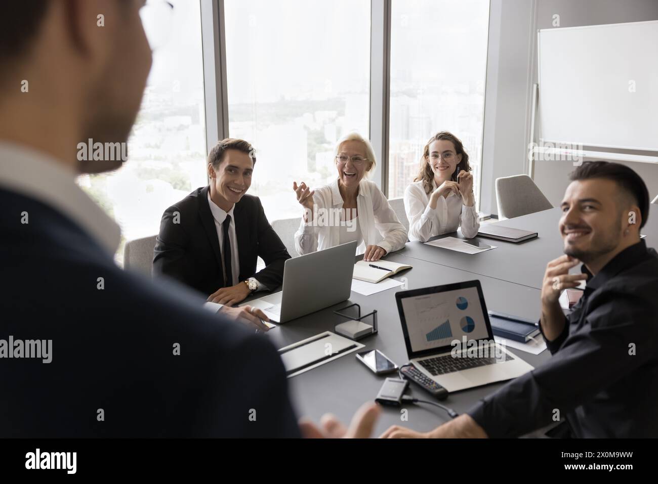 Male boss lead group training for company members Stock Photo - Alamy