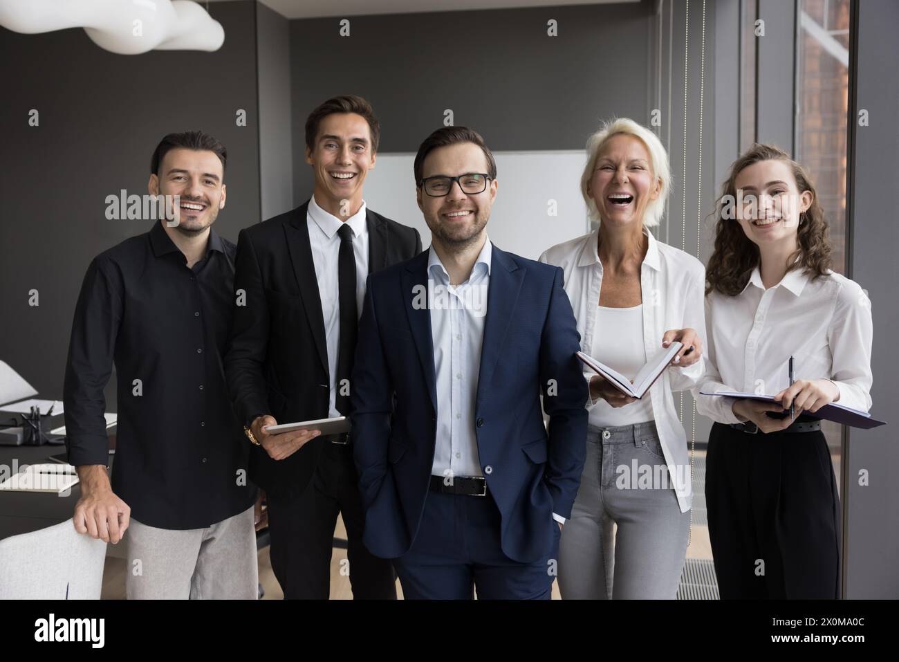 Five teammates posing camera hi-res stock photography and images - Alamy