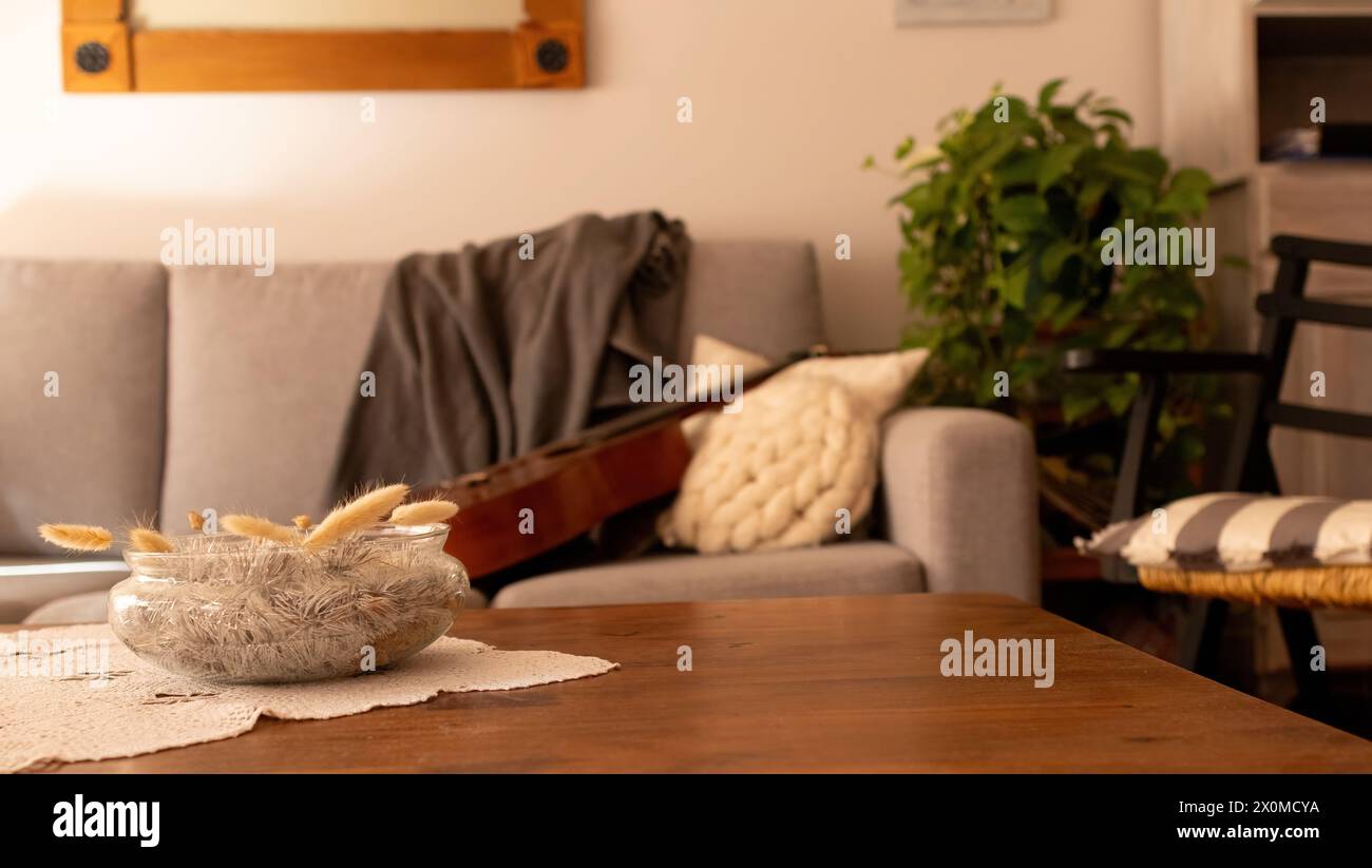 Gentle rays of sunshine coming through the window of a moder living ...