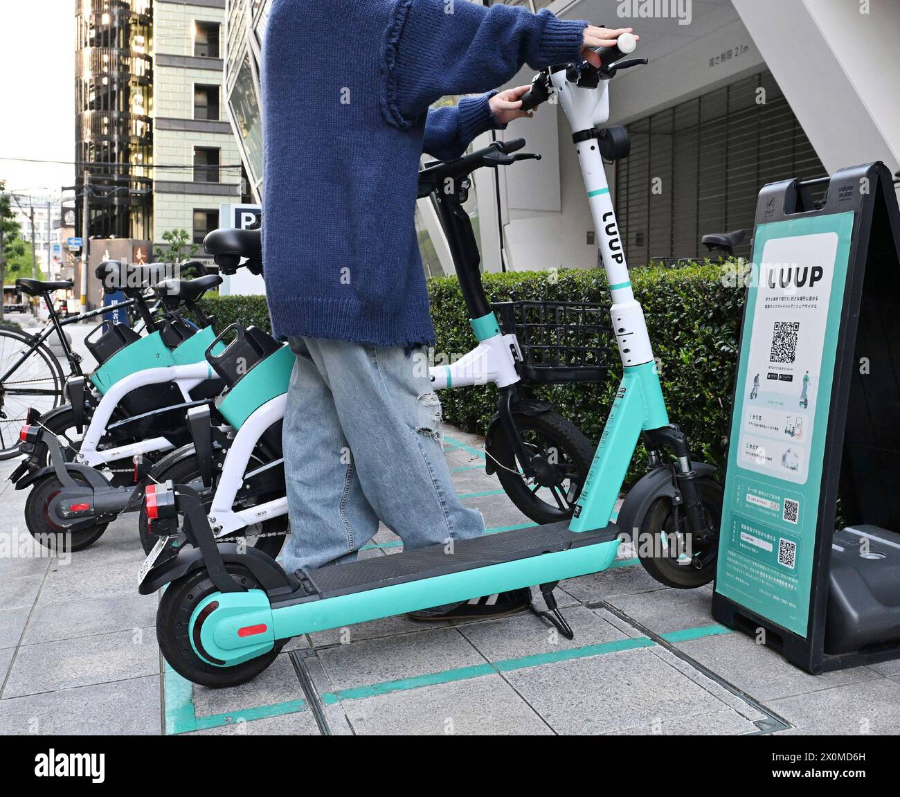 rental-electric-kick-skaters-are-pictured-at-a-business-district-in