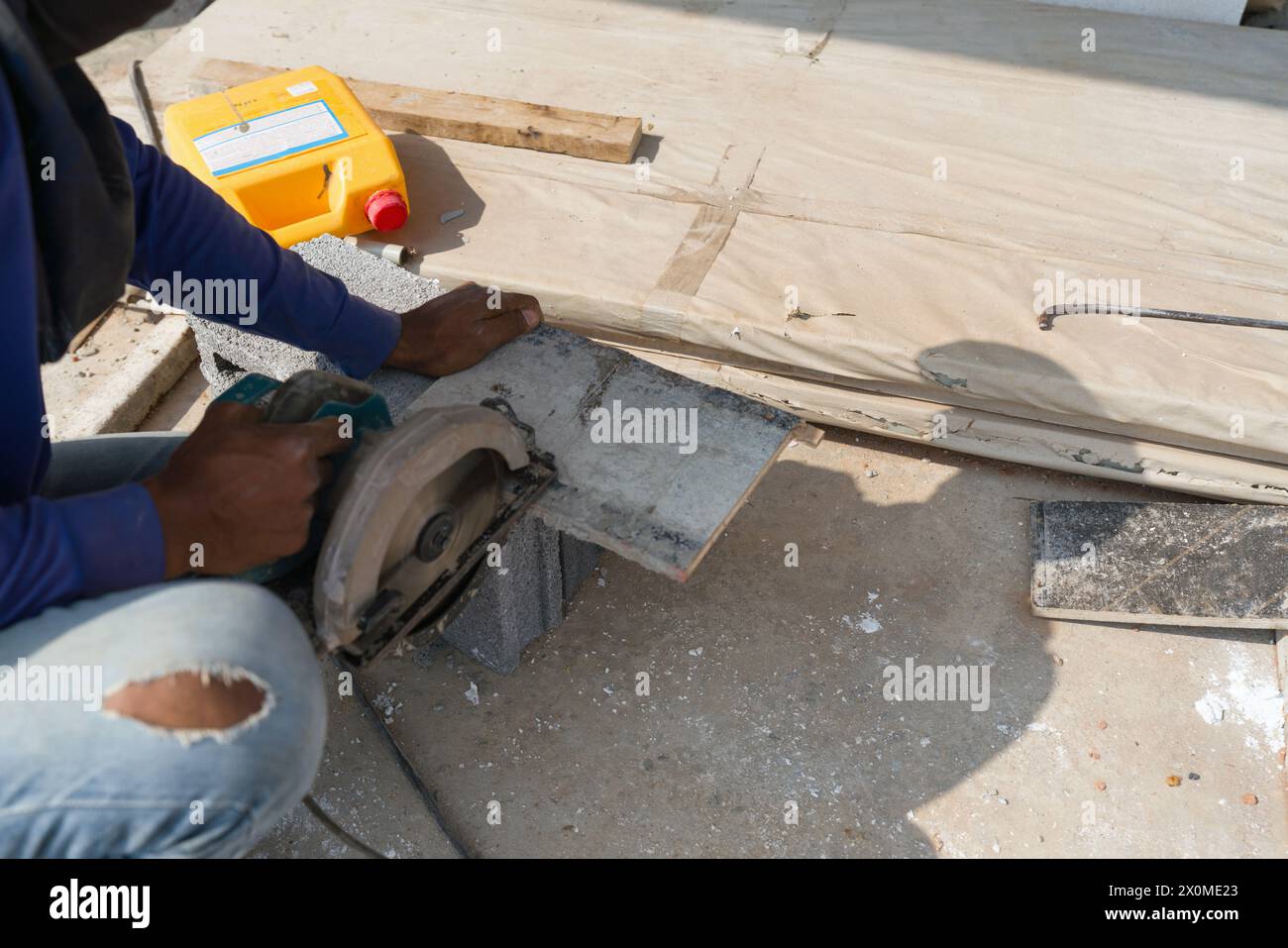 Construction worker work in the sunlight during the daytime. Use a ...
