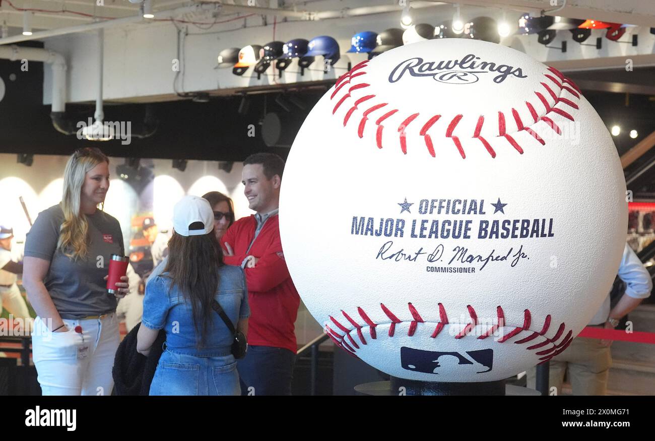 Visitors to the new Rawlings Experience Store opening are greated by a ...