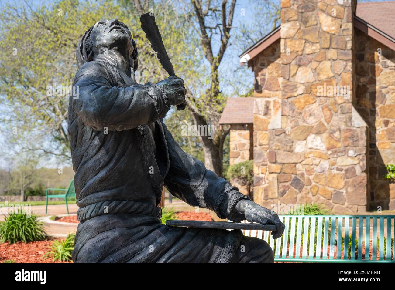 Statue of Cherokee Indian alphabet inventor, Sequoyah, looking upward ...