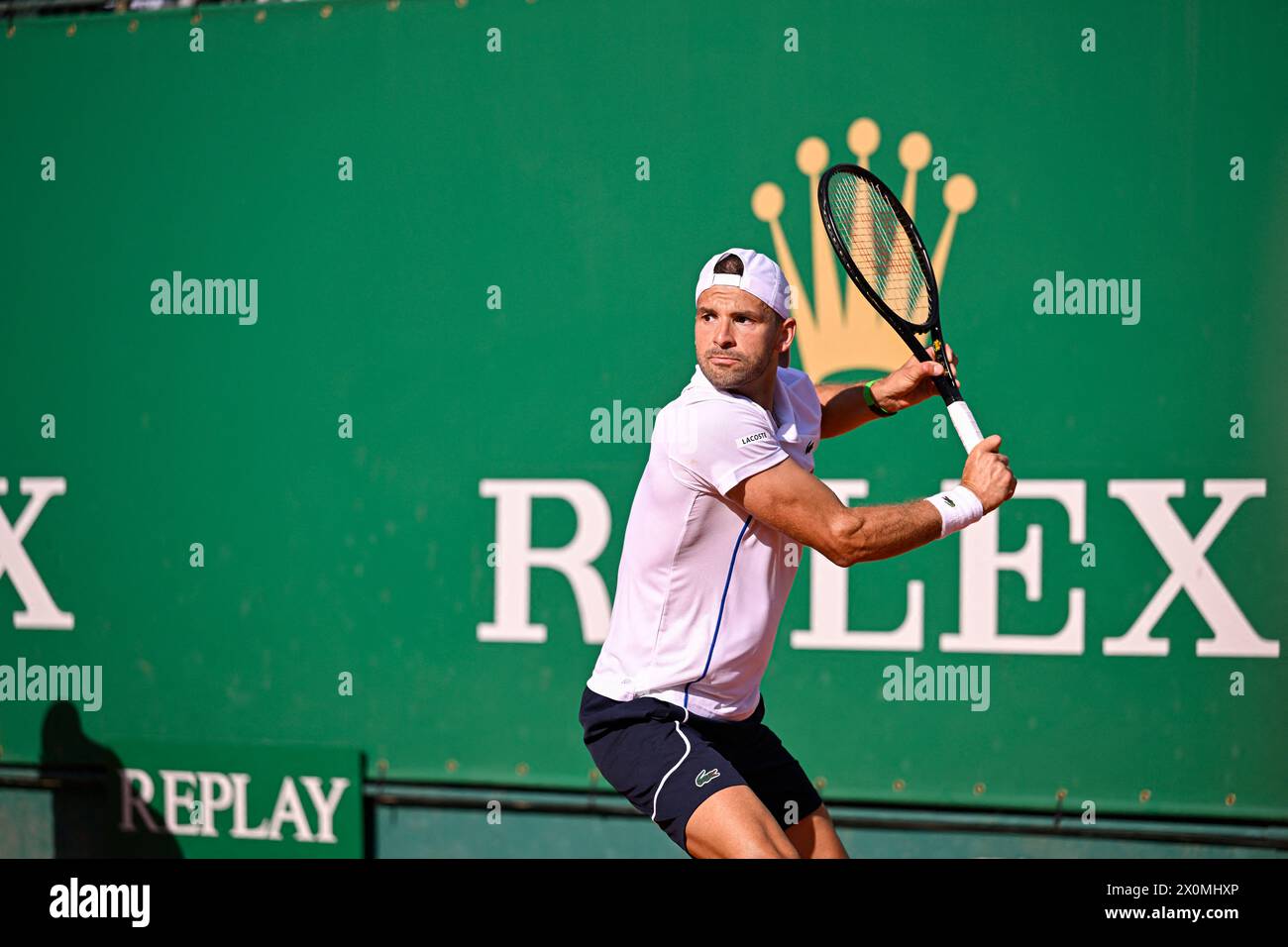 Monaco, Monaco. 11th Apr, 2024. Grigor Dimitrov hits a one-handed backhand during the Rolex ...