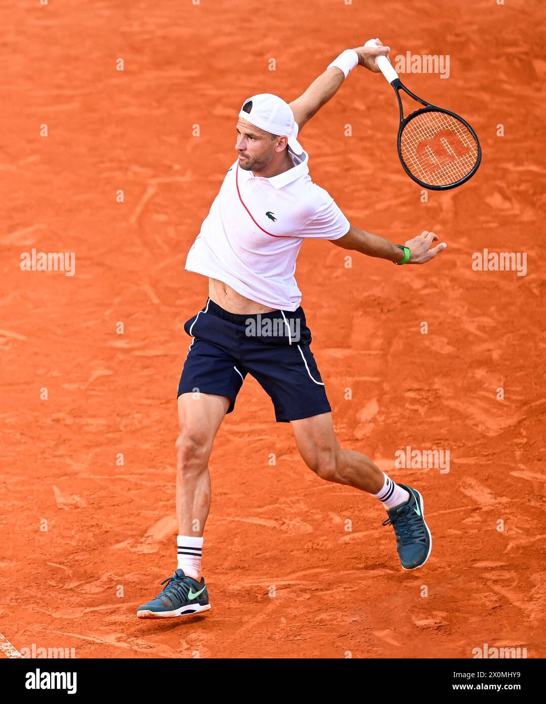 Grigor Dimitrov hits a one-handed backhand during the Rolex Monte-Carlo ...