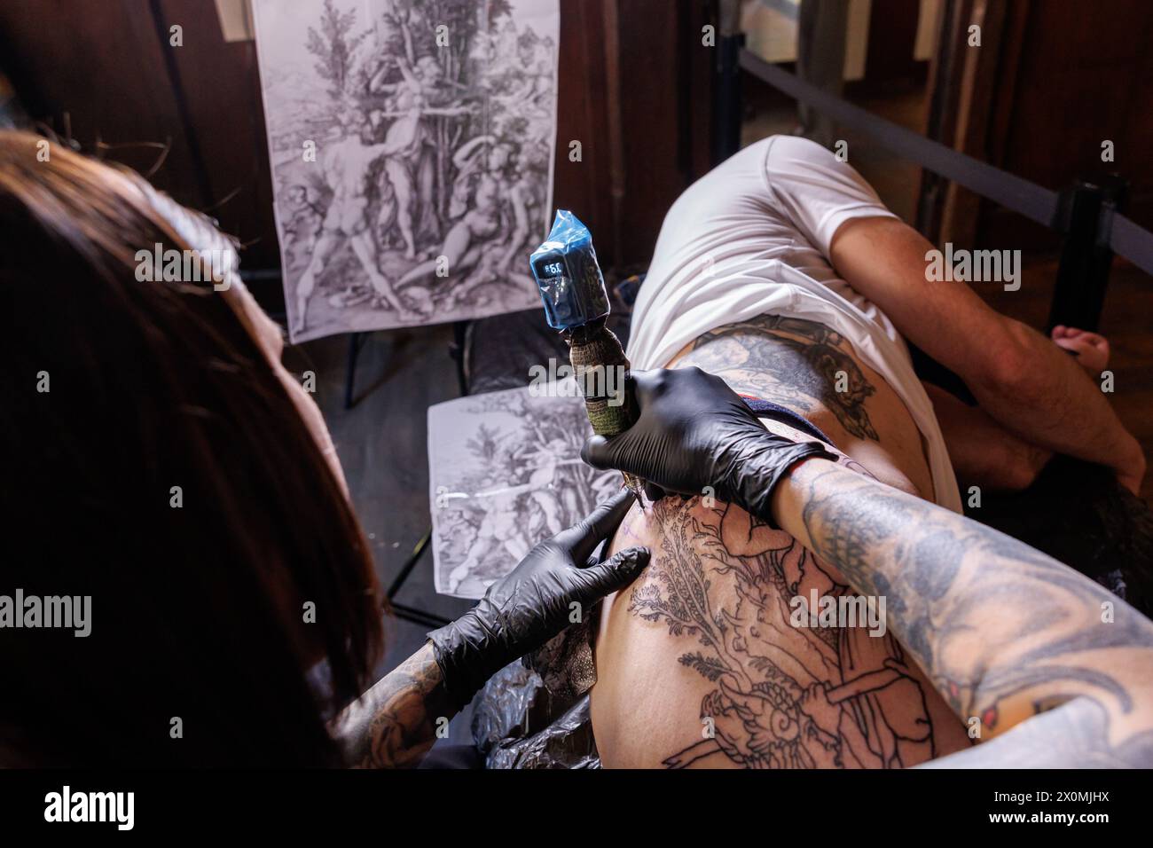 12 April 2024, Bavaria, Nuremberg: French tattoo artist Maud Dardeau ...