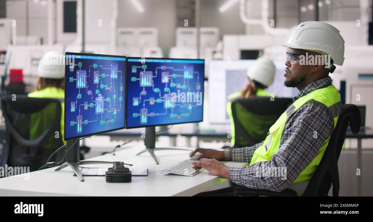 Engineer Operators Using Scada System At Industrial Plant Stock Photo - Alamy