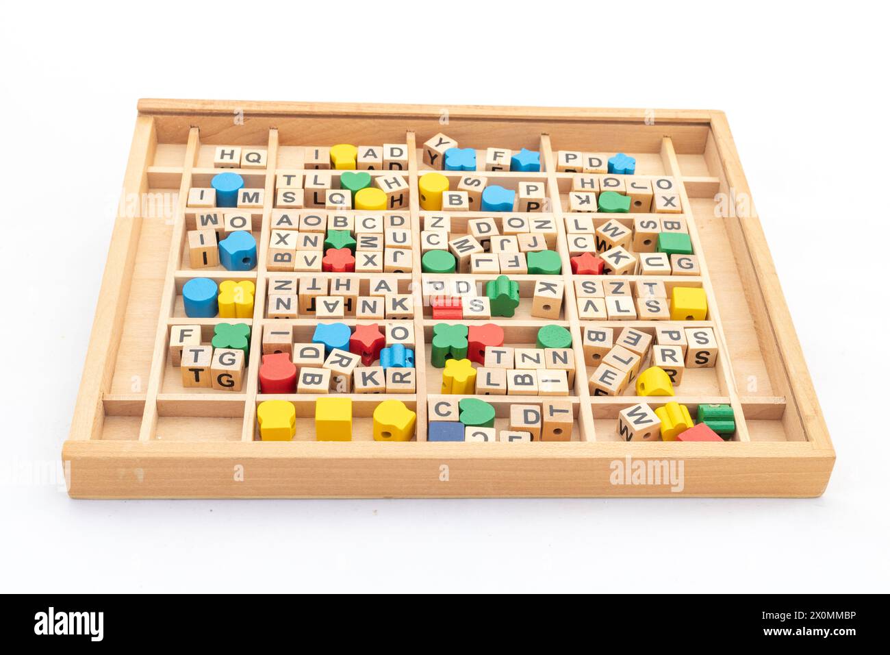 Wooden letters in the box isolated on white background Stock Photo - Alamy