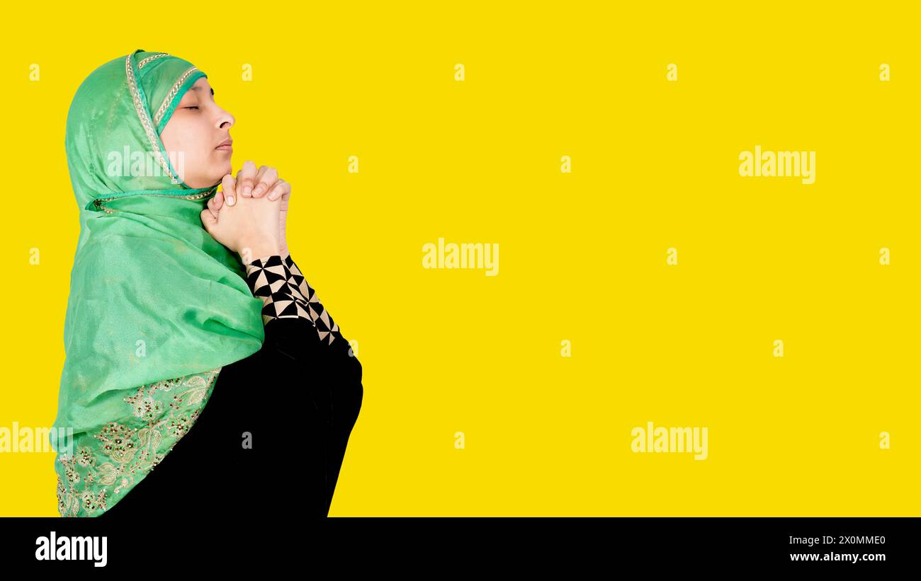 A Side View of Beautiful Muslim Girl Praying to Allah, Copy Space Stock ...