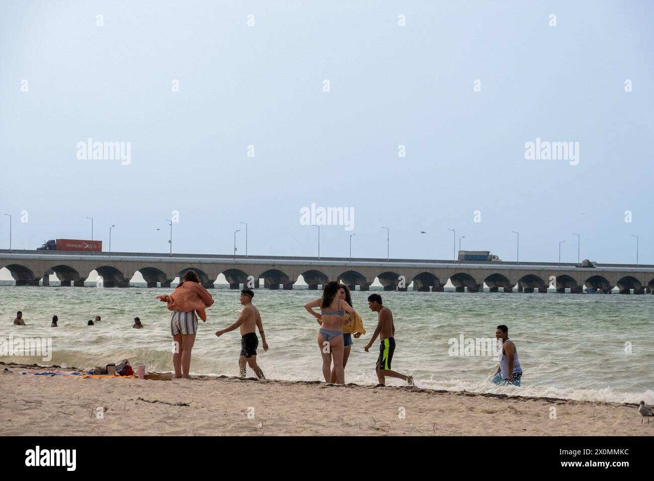 Tourists and locals enjoy a spring day at Progreso Beach, a more ...