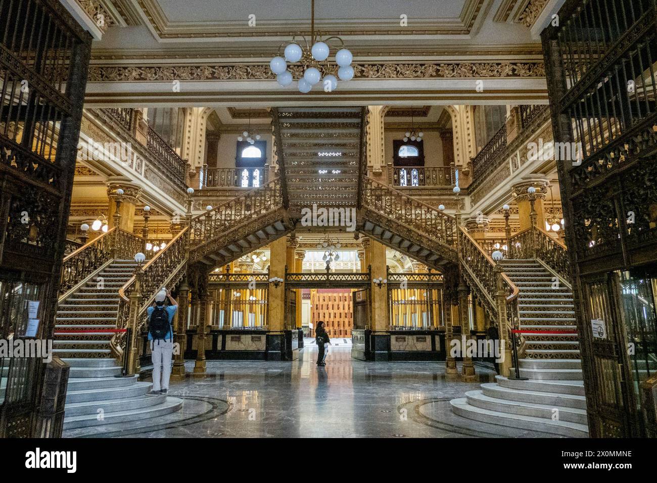 Visitors explore the architectural wonders of the historic post office ...
