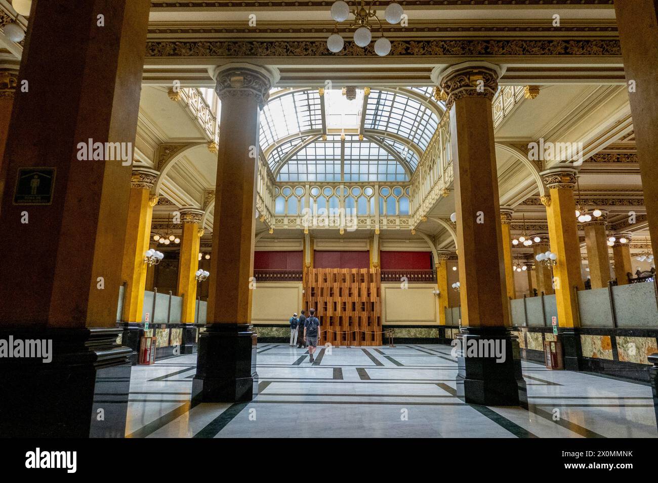 Visitors explore the architectural wonders of the historic post office ...