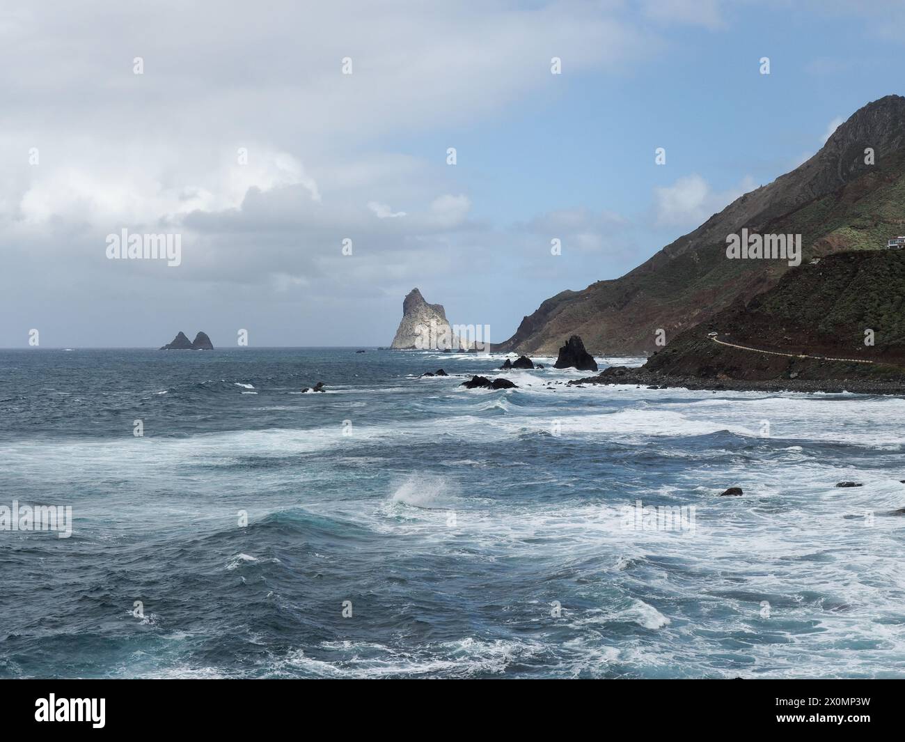 Playa del Roque, Spain: view of the beach and the rushing sea Stock ...