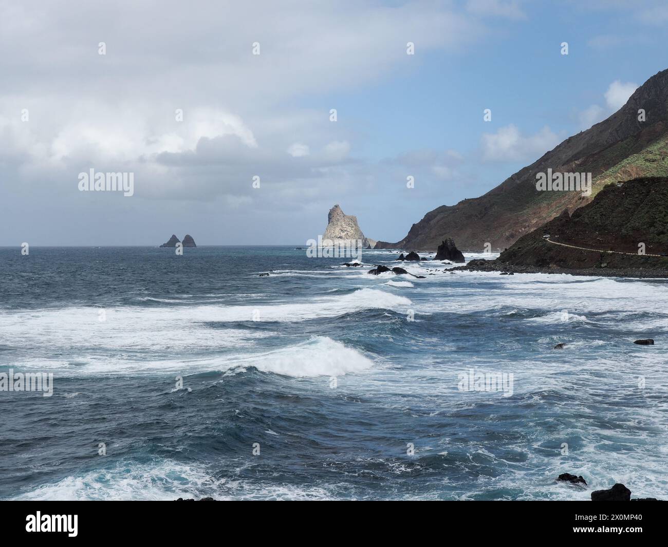 Playa del Roque, Spain: view of the beach and the rushing sea Stock ...