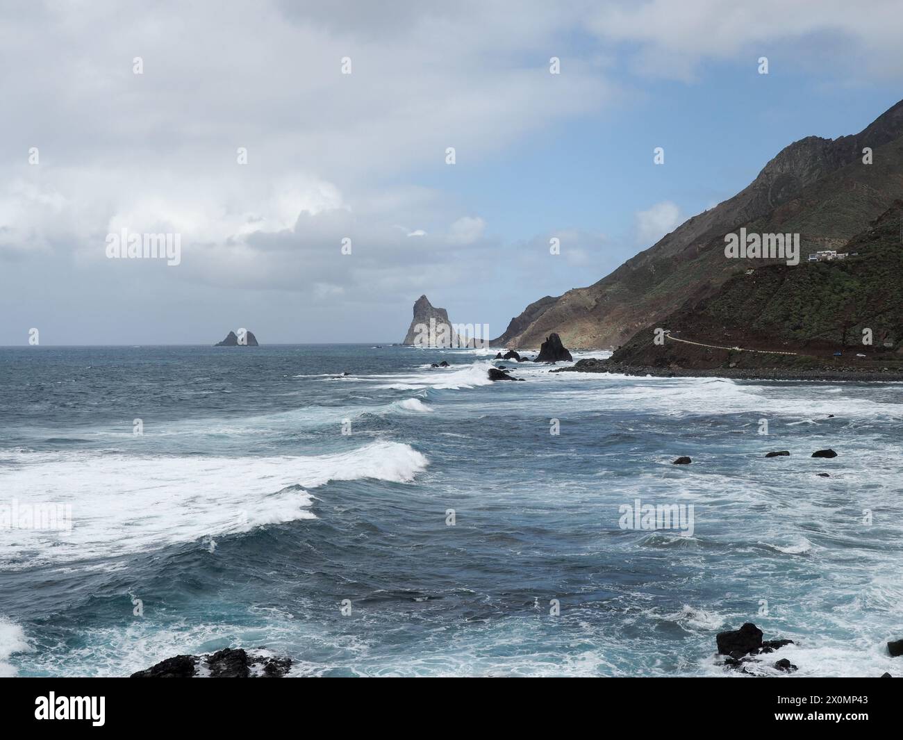 Playa del Roque, Spain: view of the beach and the rushing sea Stock ...