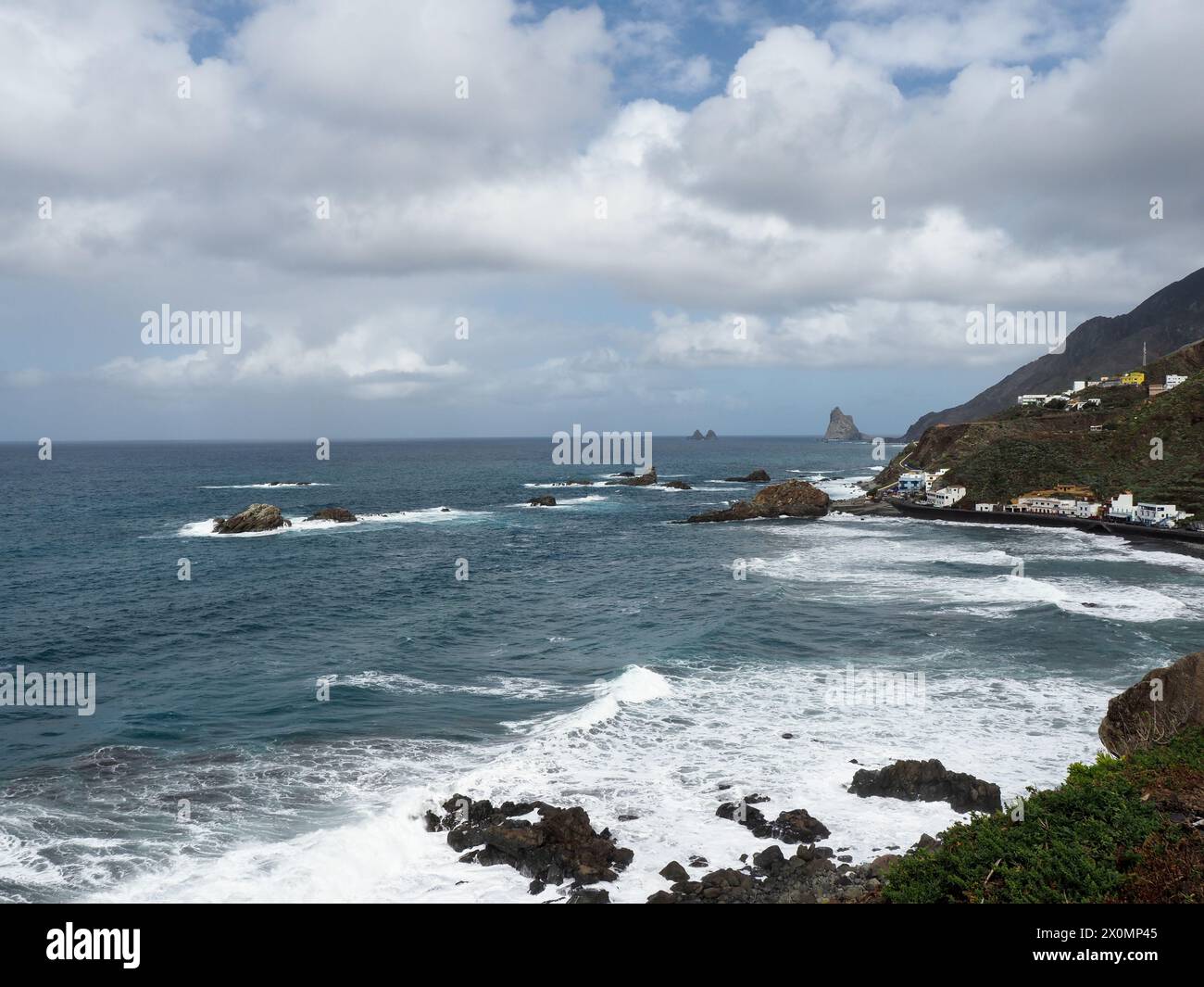 Playa del Roque, Spain: view of the beach and the rushing sea Stock ...
