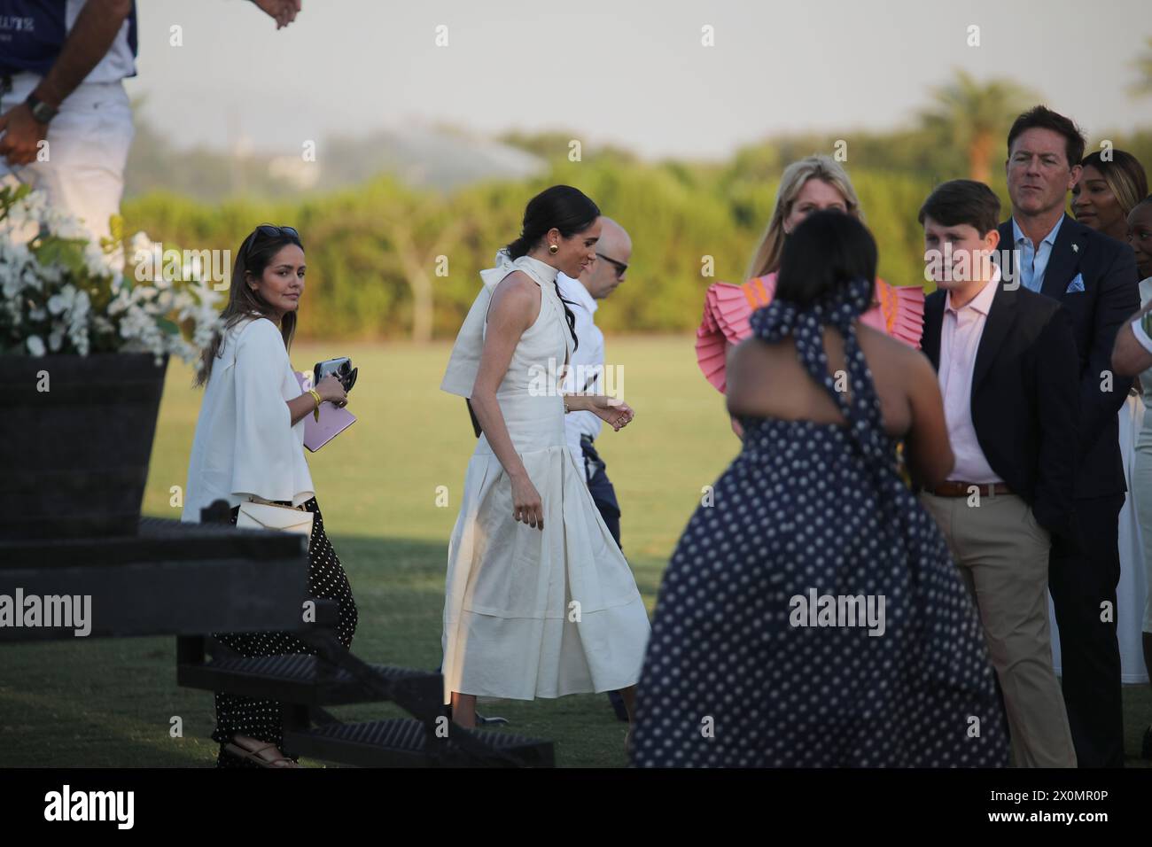 The Duchess of Sussex after the Duke of Sussex played in a polo match during the Royal Salute ...