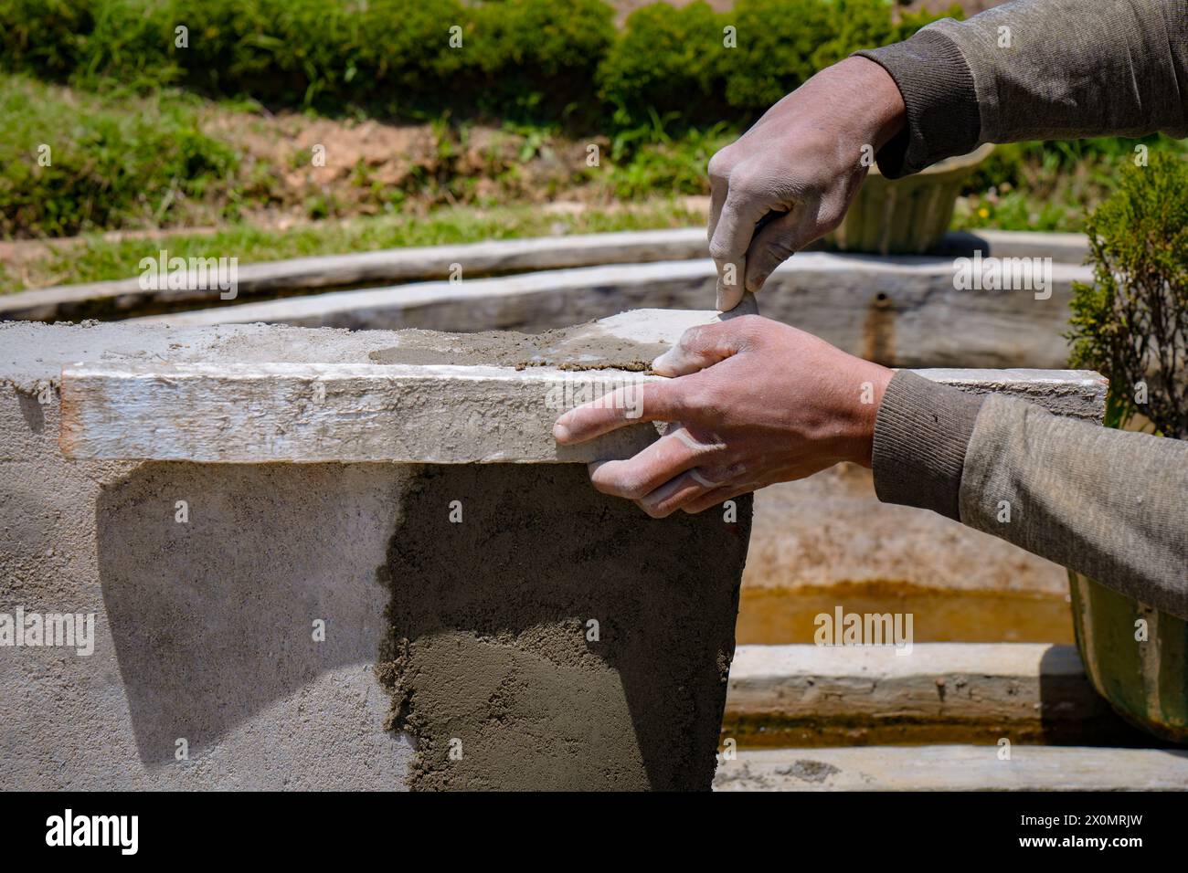 Plastering labor trowel hi-res stock photography and images - Alamy
