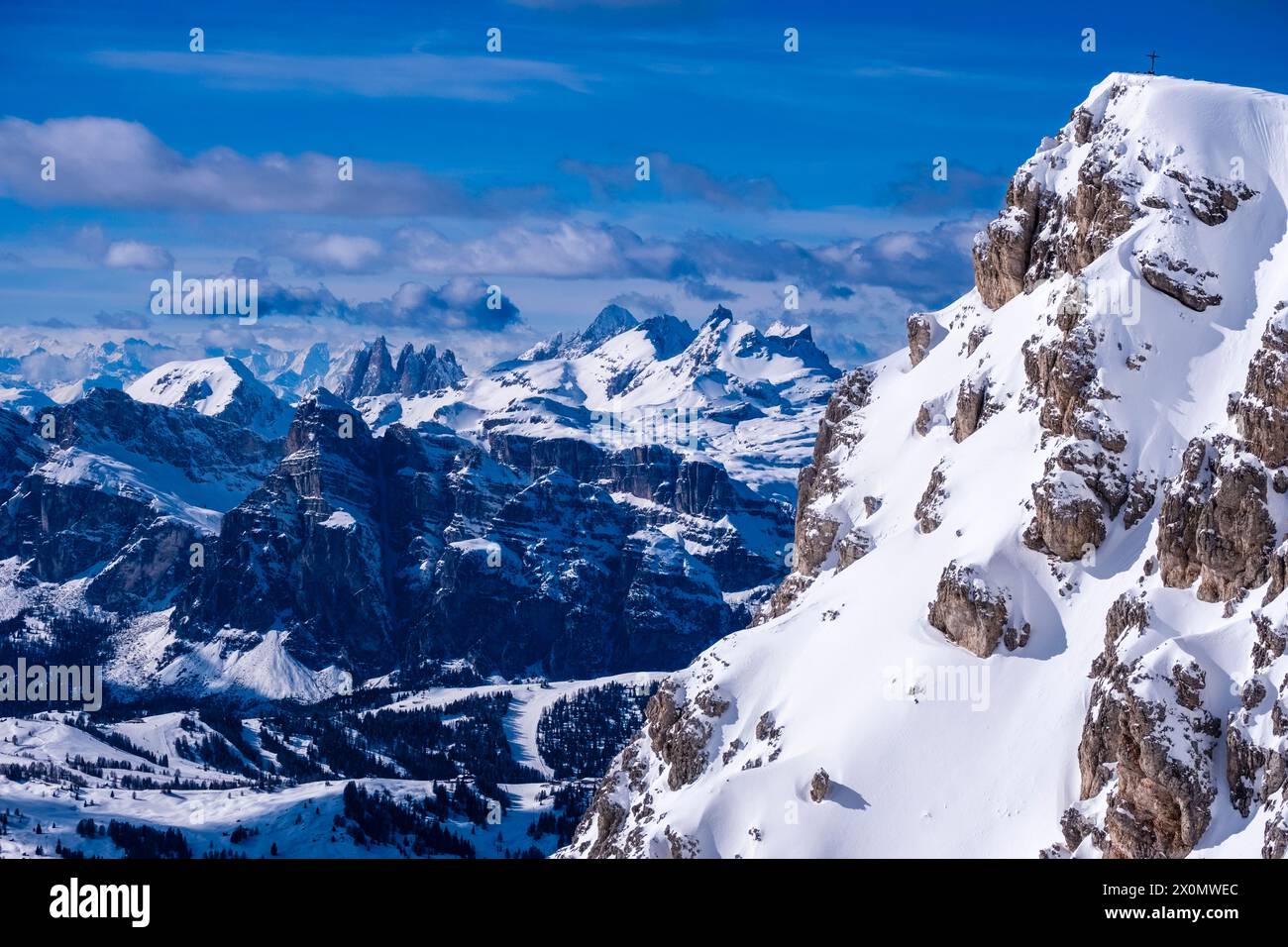 The snow-covered summit of Piccolo Lagazuoi, surrounded by alpine ...