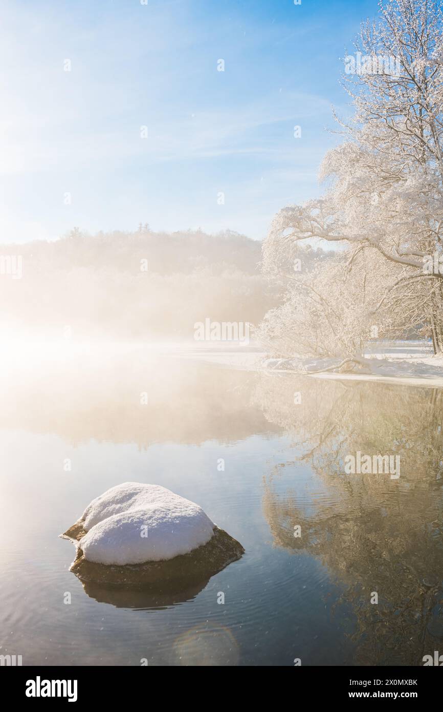 Golden sunlight pierces through mist hi-res stock photography and ...