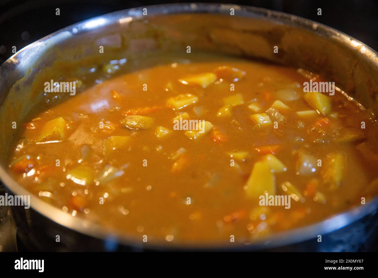 Vegetable curry being cooked hi-res stock photography and images - Alamy