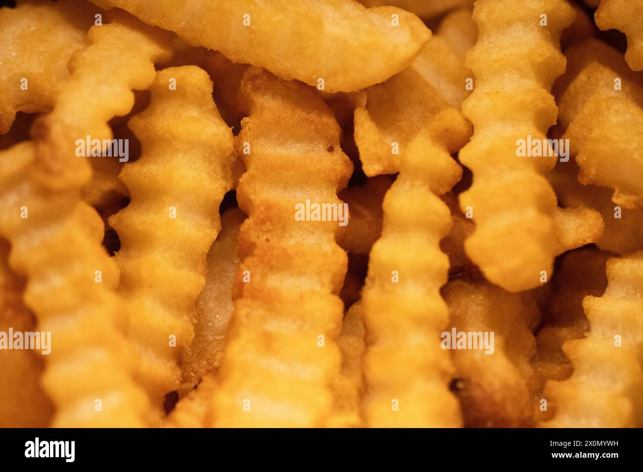 Air Fried Crinkle Fries shot close up Stock Photo - Alamy