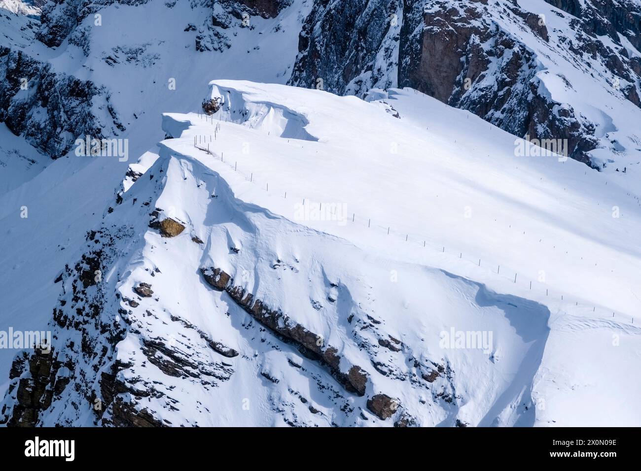Snow-covered pastures below the Odle group, surrounded by alpine ...