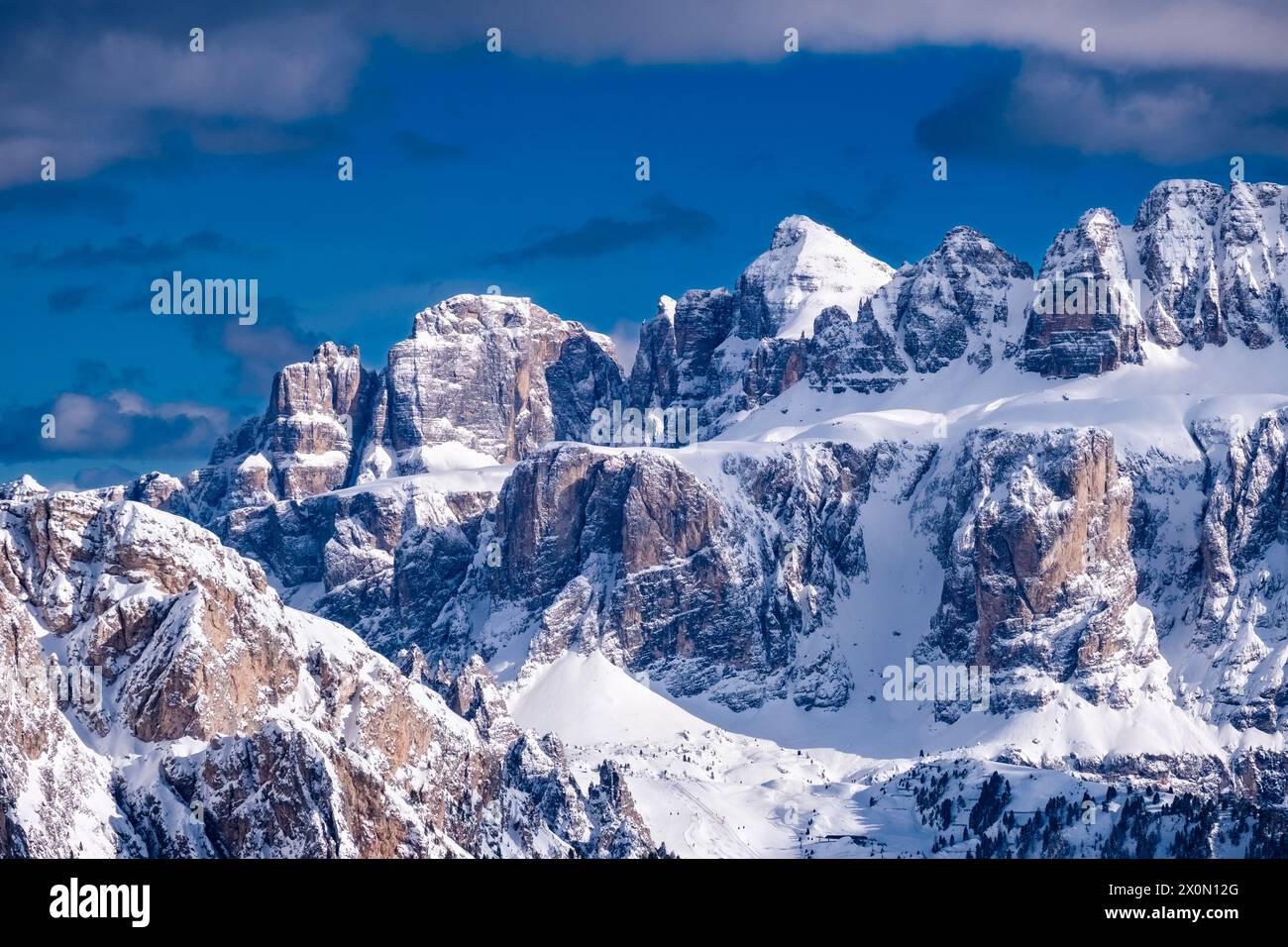 The snow-covered summits of Piz da Lech (left) and Cima Pisciadù (right ...